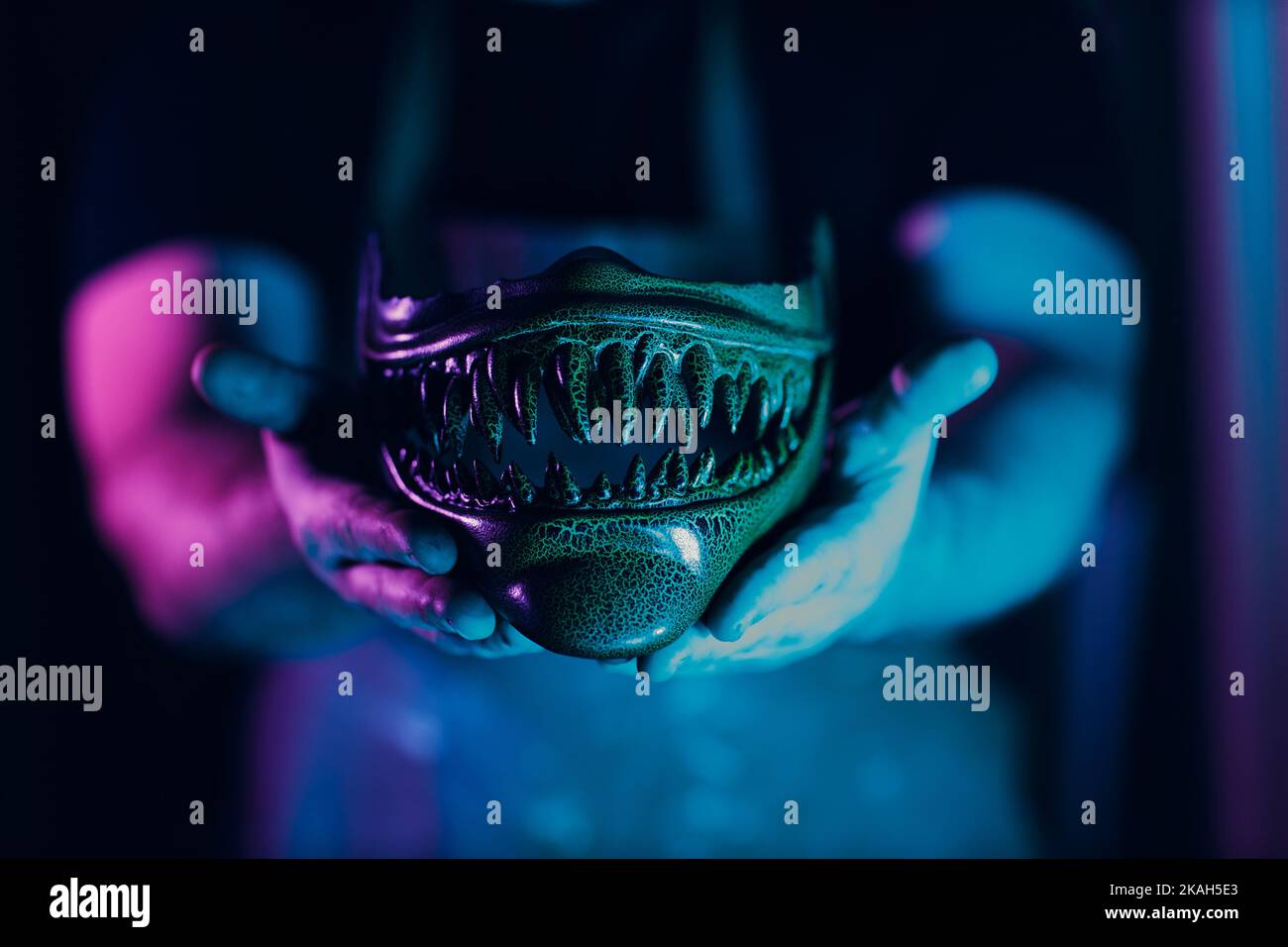 Scary plastic mask. Artisan craftsman create mask based on plaster cast ...