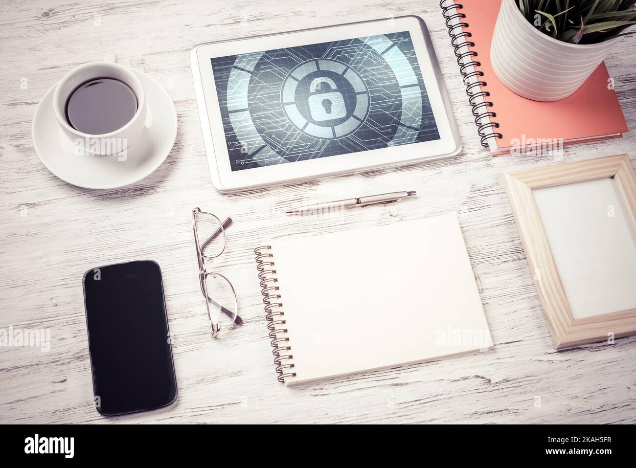 Web security and technology concept with tablet pc on wooden table ...