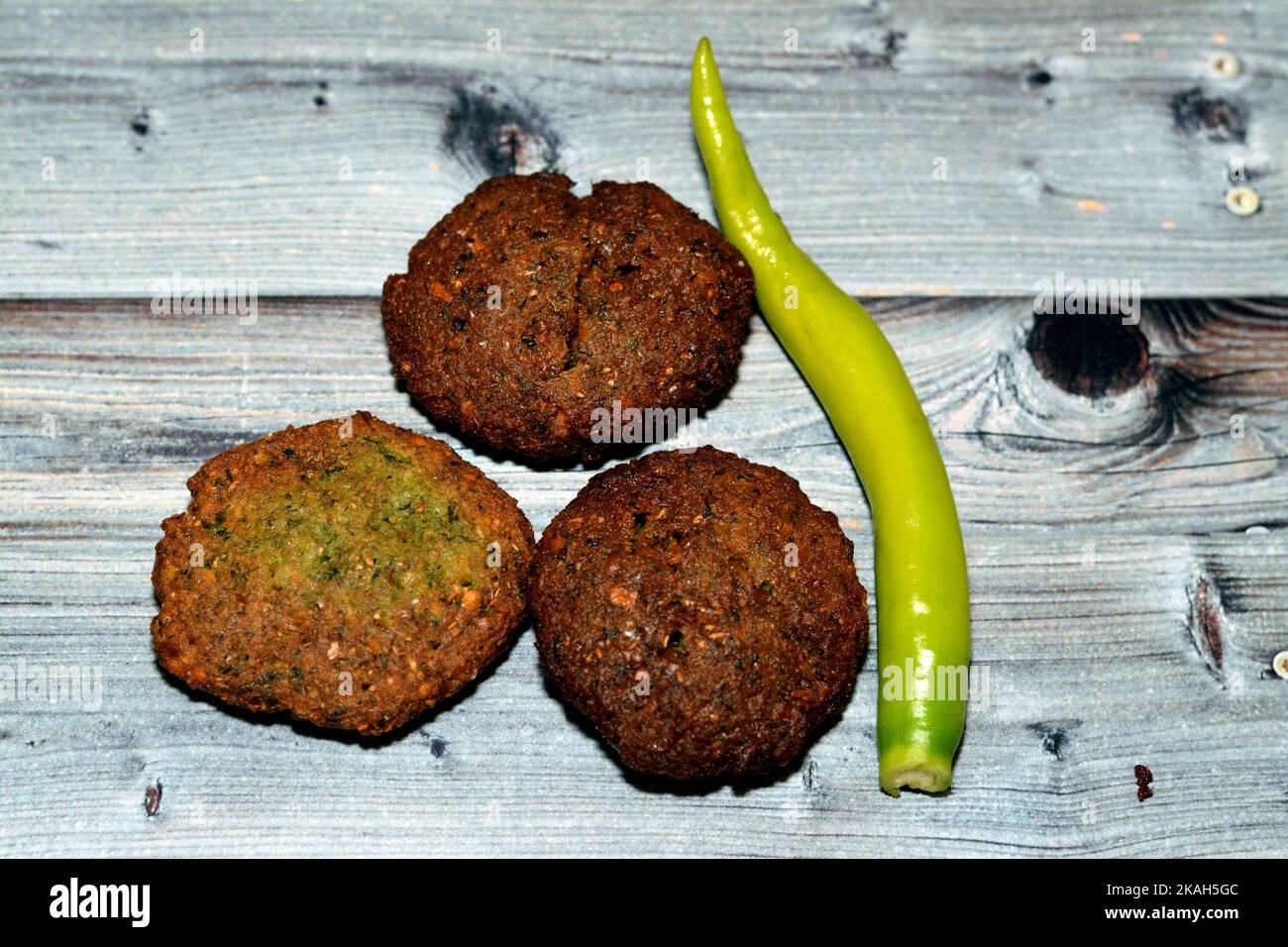 Traditional Egyptian fried falafel balls, green burger, made of ground ...