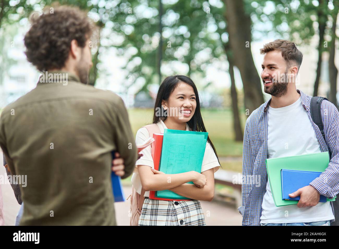 College students talking folder hi-res stock photography and images - Alamy