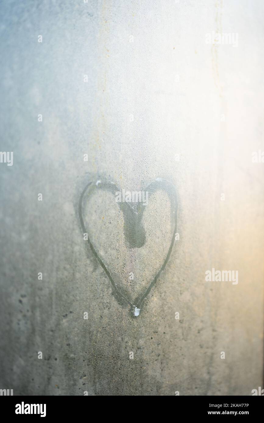 Heart shape drawing on fogged up glass Stock Photo - Alamy