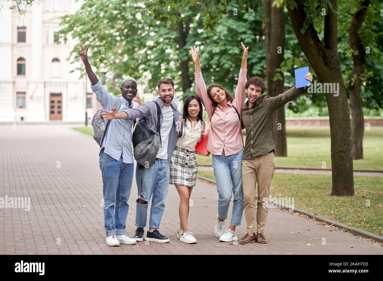 happy friends students taking pictures for memory Stock Photo - Alamy