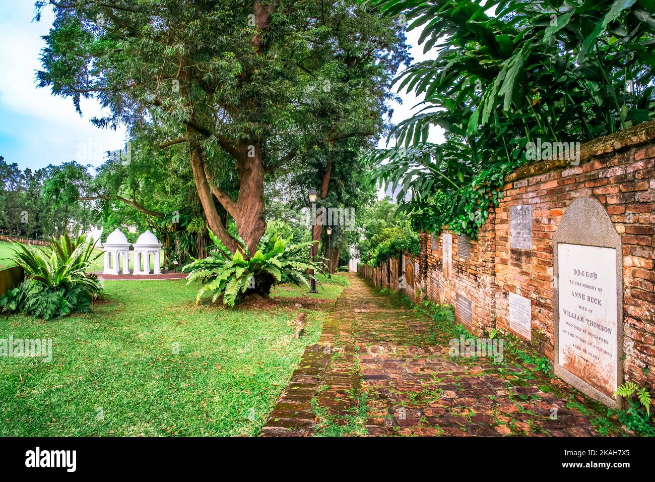 The memorial headstones that incorporated into a beautiful brick wall ...