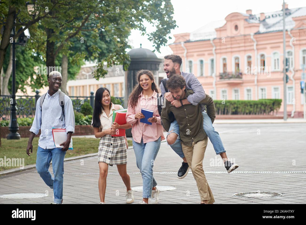 group of students cheerfully walking after the exam Stock Photo - Alamy