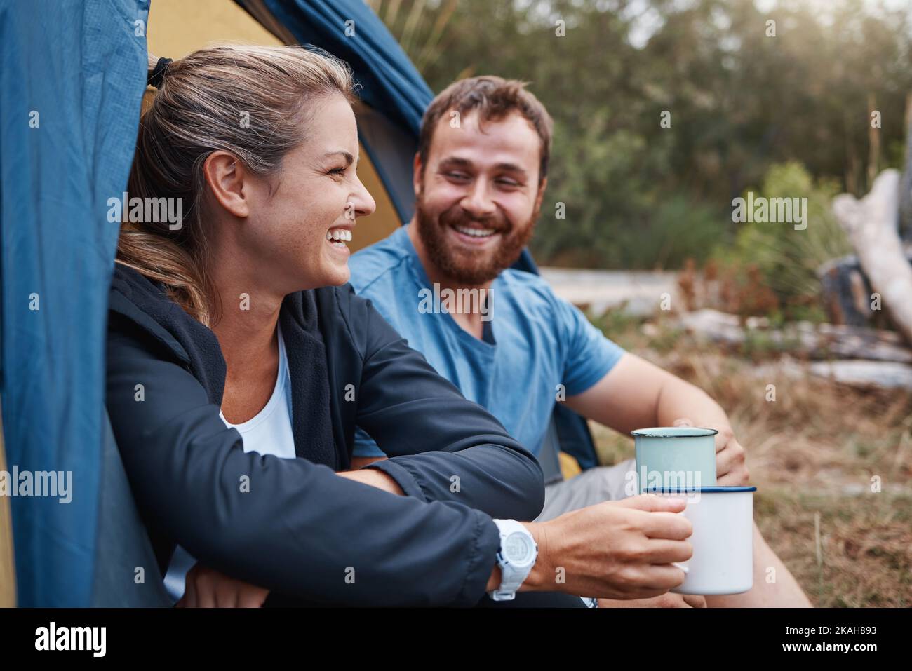 Couple, bonding or drinking coffee in camping tent in nature earth ...