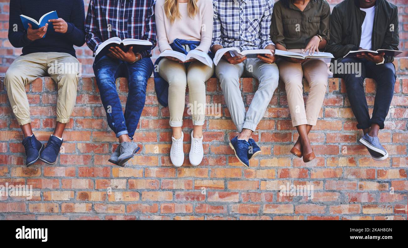 Youve gotta make time to study. a group of unrecognizable university ...