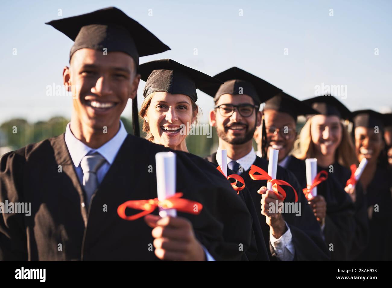 Our hard work finally paid off. Portrait of a smiling university ...