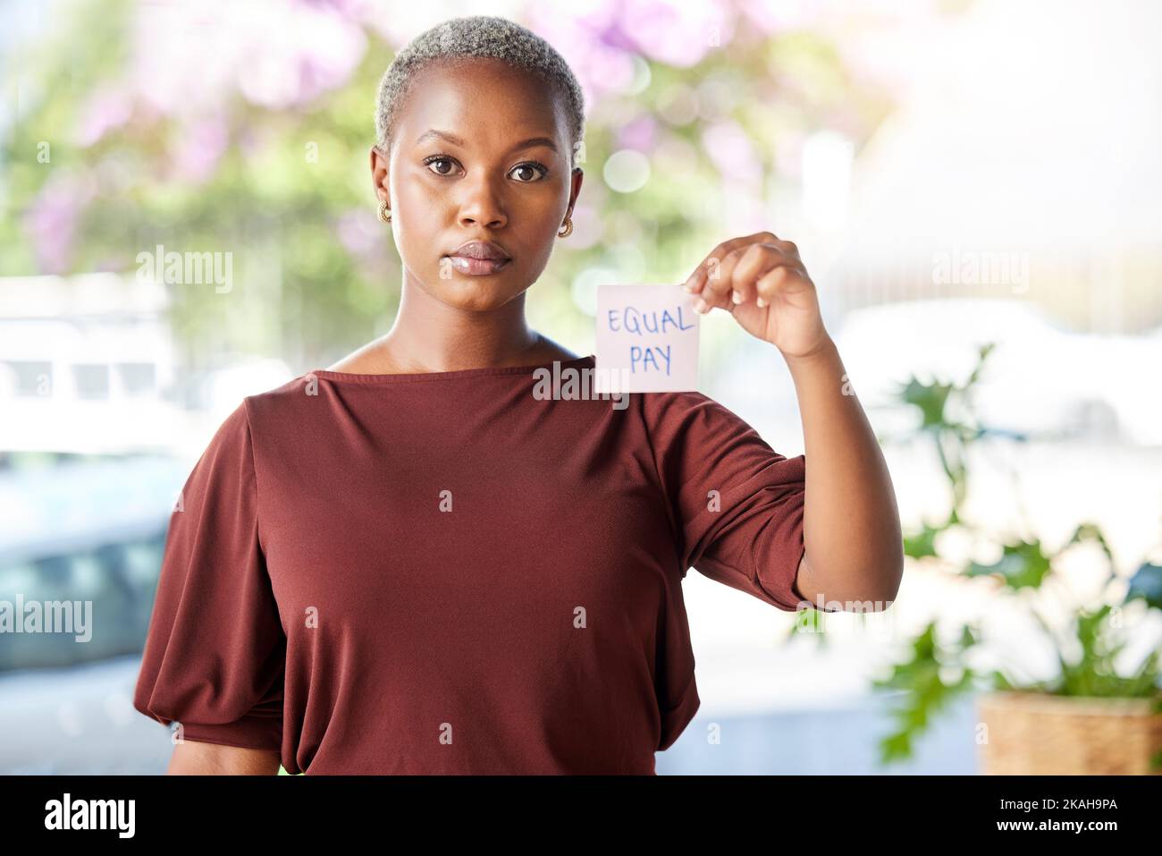 Black woman, equal pay and paper sign for financial equality ...
