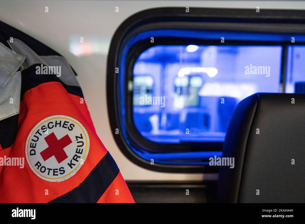 03 November 2022, Hesse, Frankfurt/Main: A DRK emergency jacket in the ...