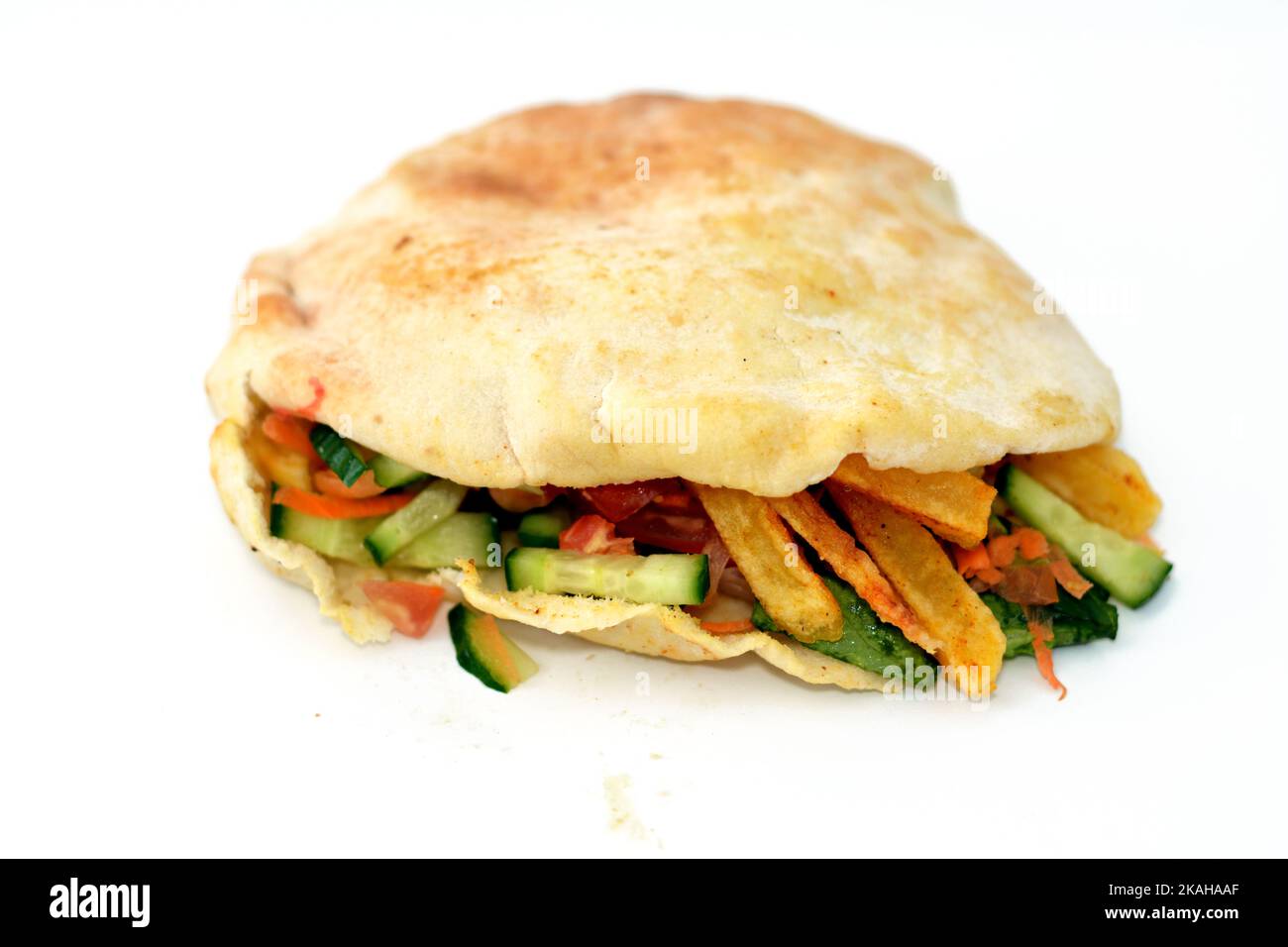 Flat Shami Syrian bread filled with french fries and green salad ...