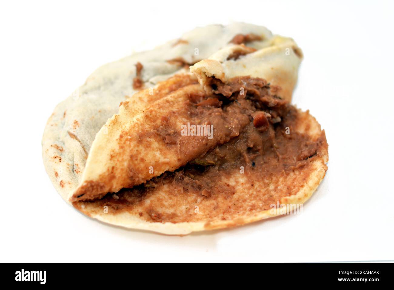 Shami Syrian pita bread with mashed fava beans mixed with oil, sesame ...