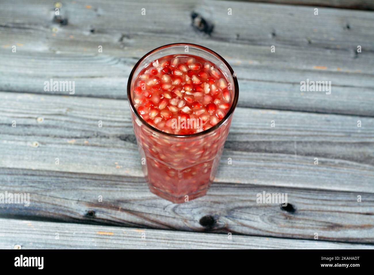 The pomegranate (Punica granatum), a fruit-bearing deciduous shrub in ...