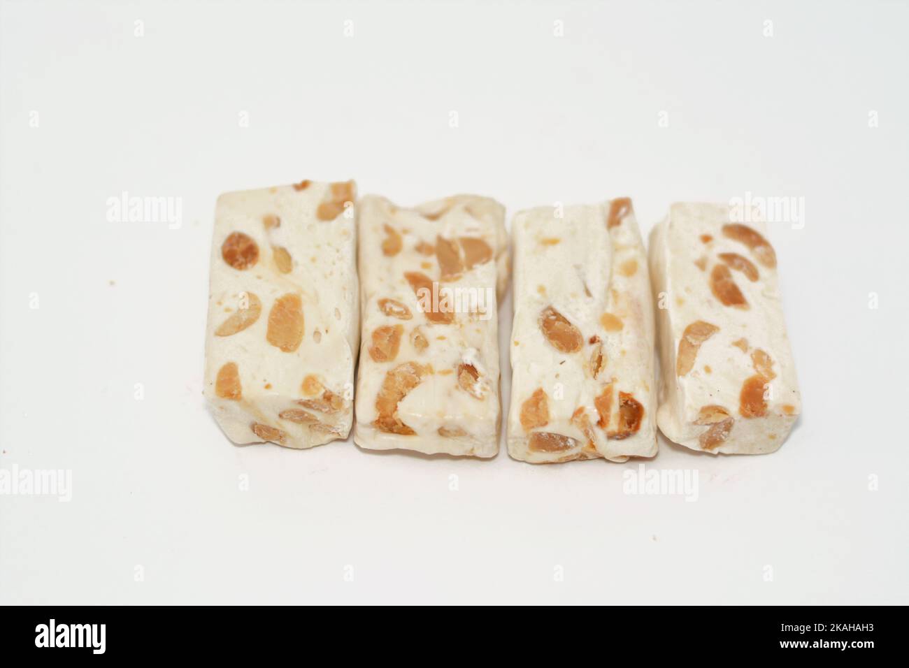 Pieces of Arabic sweet delicious Noga with peanuts,Egyptian cultural ...