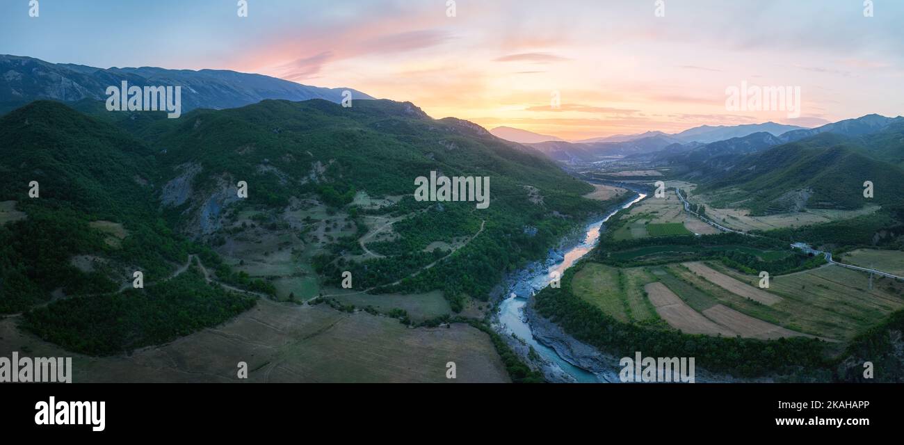 Panoramic landscape, aerial view of the Vjosë river and valley against ...