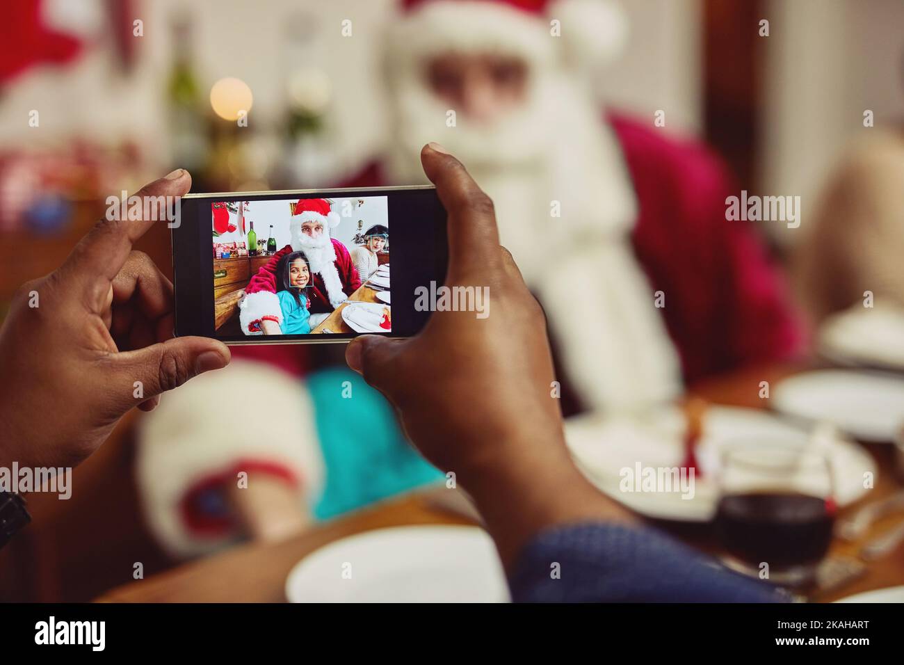 The day she finally met Santa. Closeup shot of a person taking a photo ...