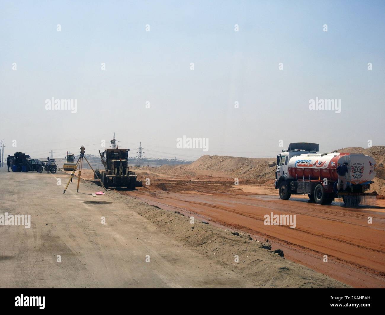 Giza, Egypt, July 25 2022: ground leveling with grader truck and laser ...