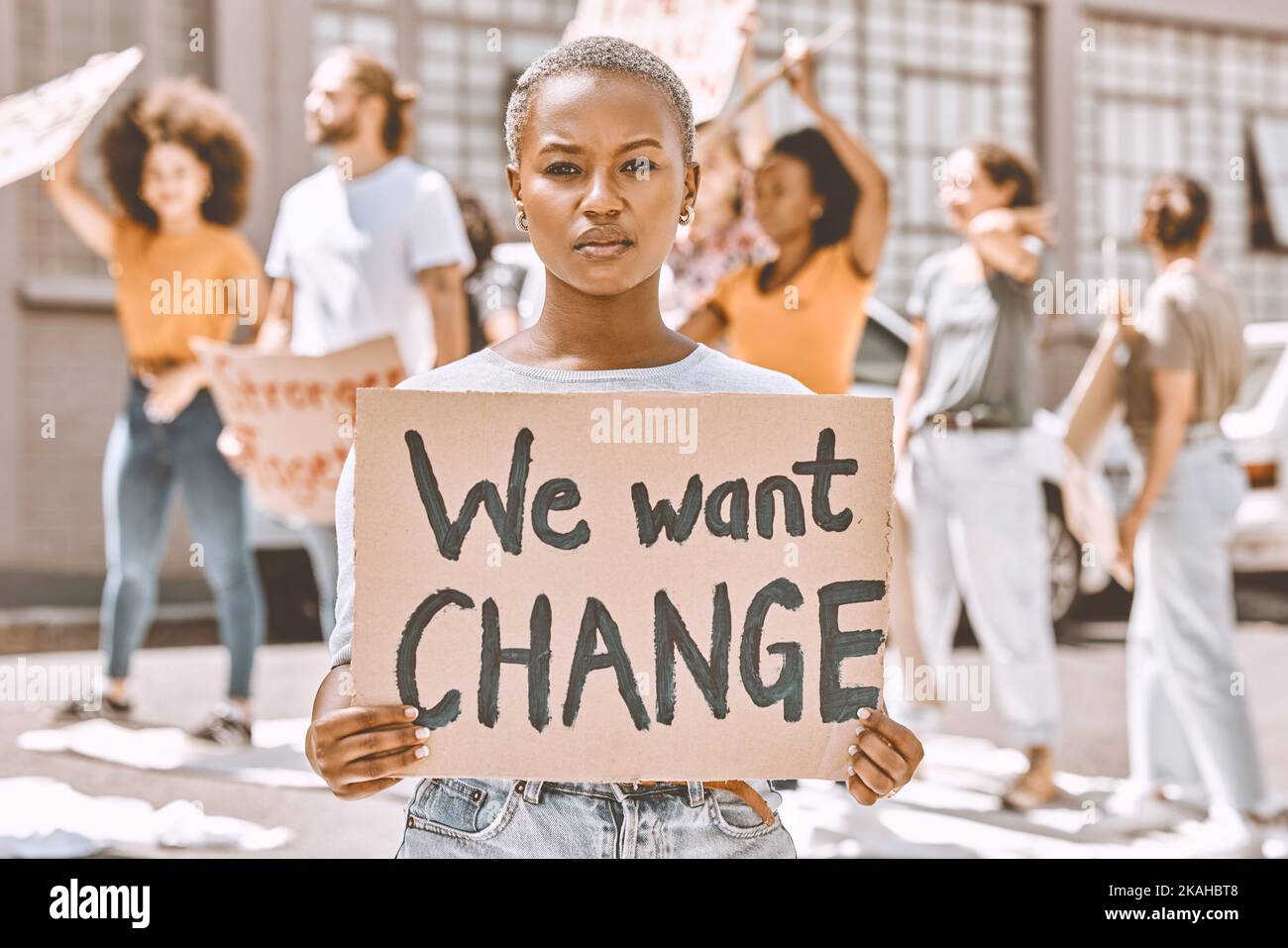 Black woman, protest group and sign about peace, justice and gender ...