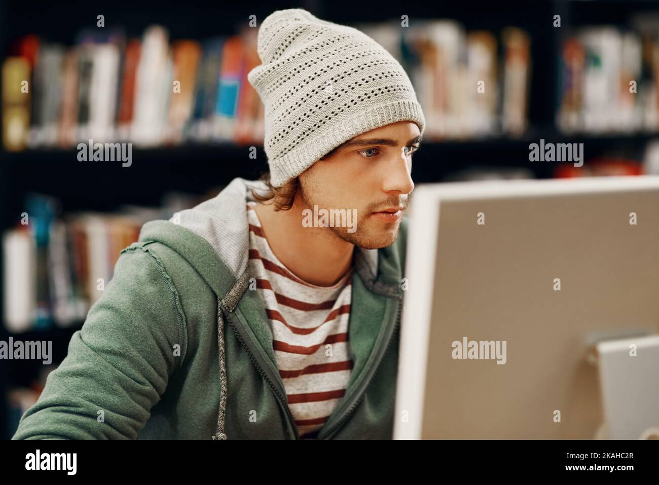Finals come and go so quickly. High angle shot of a young male ...