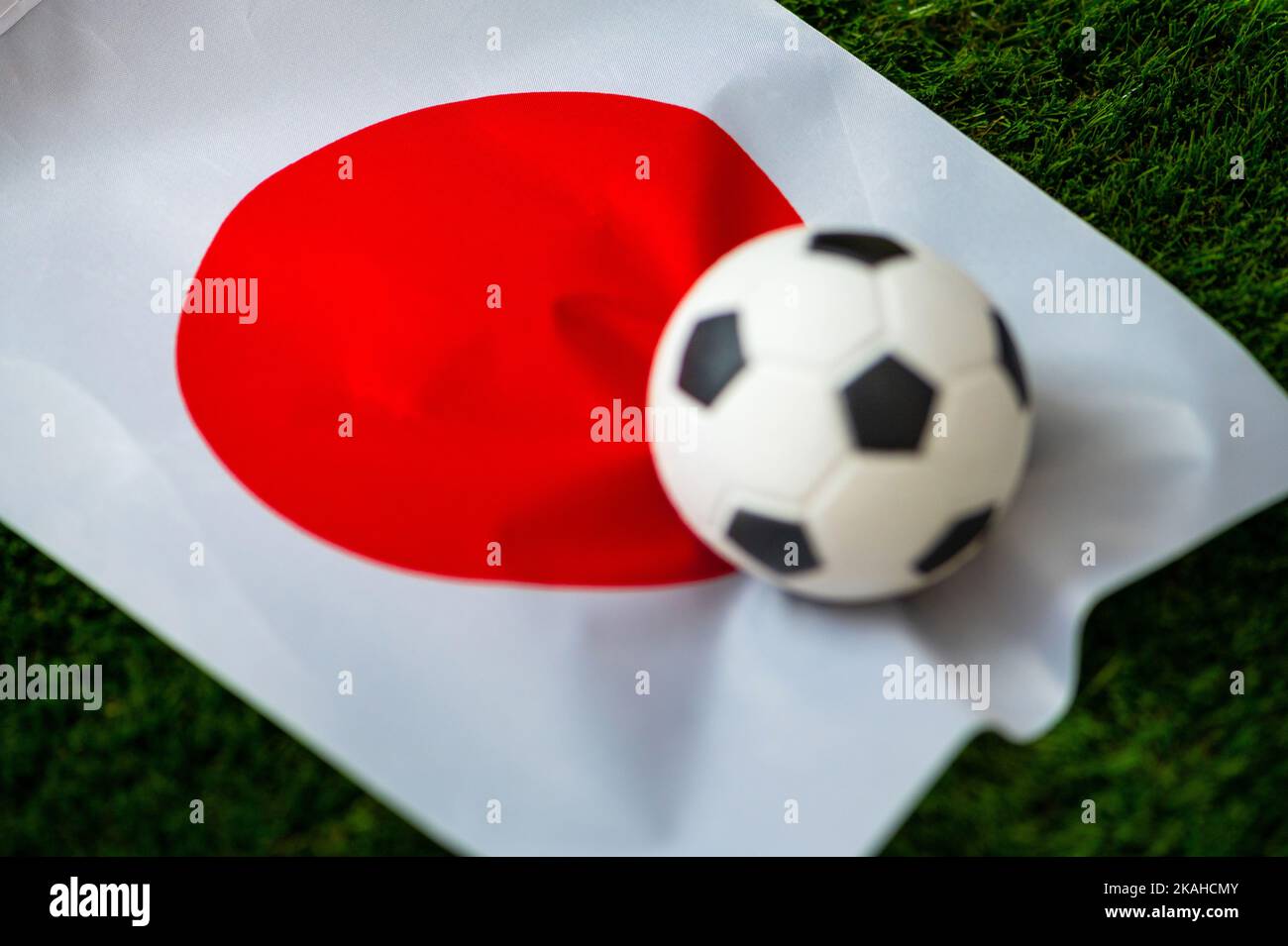 Japan national football team. National Flag on green grass and soccer ...