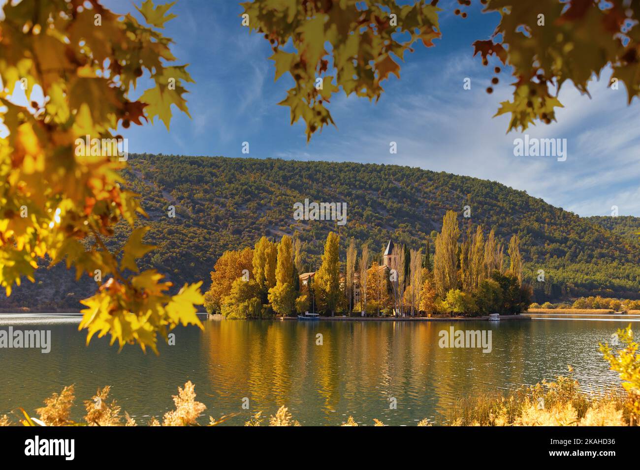 Visovac Island and Visovac Monastery in golden autumn colors. Krka ...