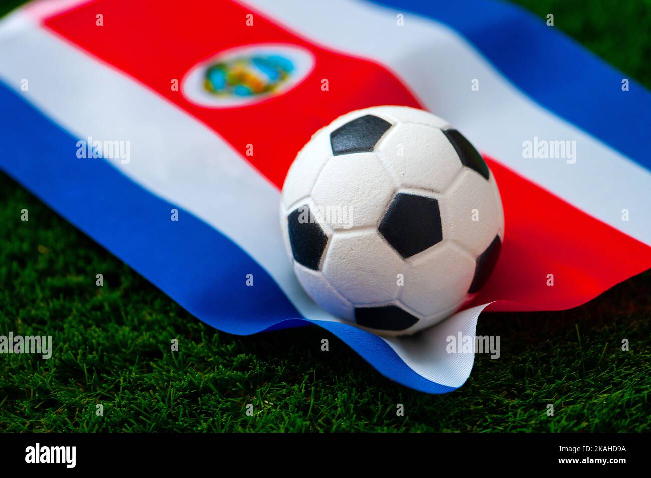 Costa Rica national football team. National Flag on green grass and ...