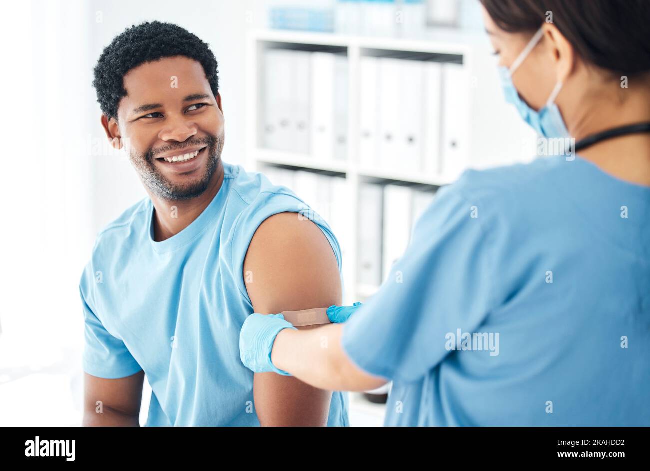 Man arm bandaid vaccine hi-res stock photography and images - Alamy