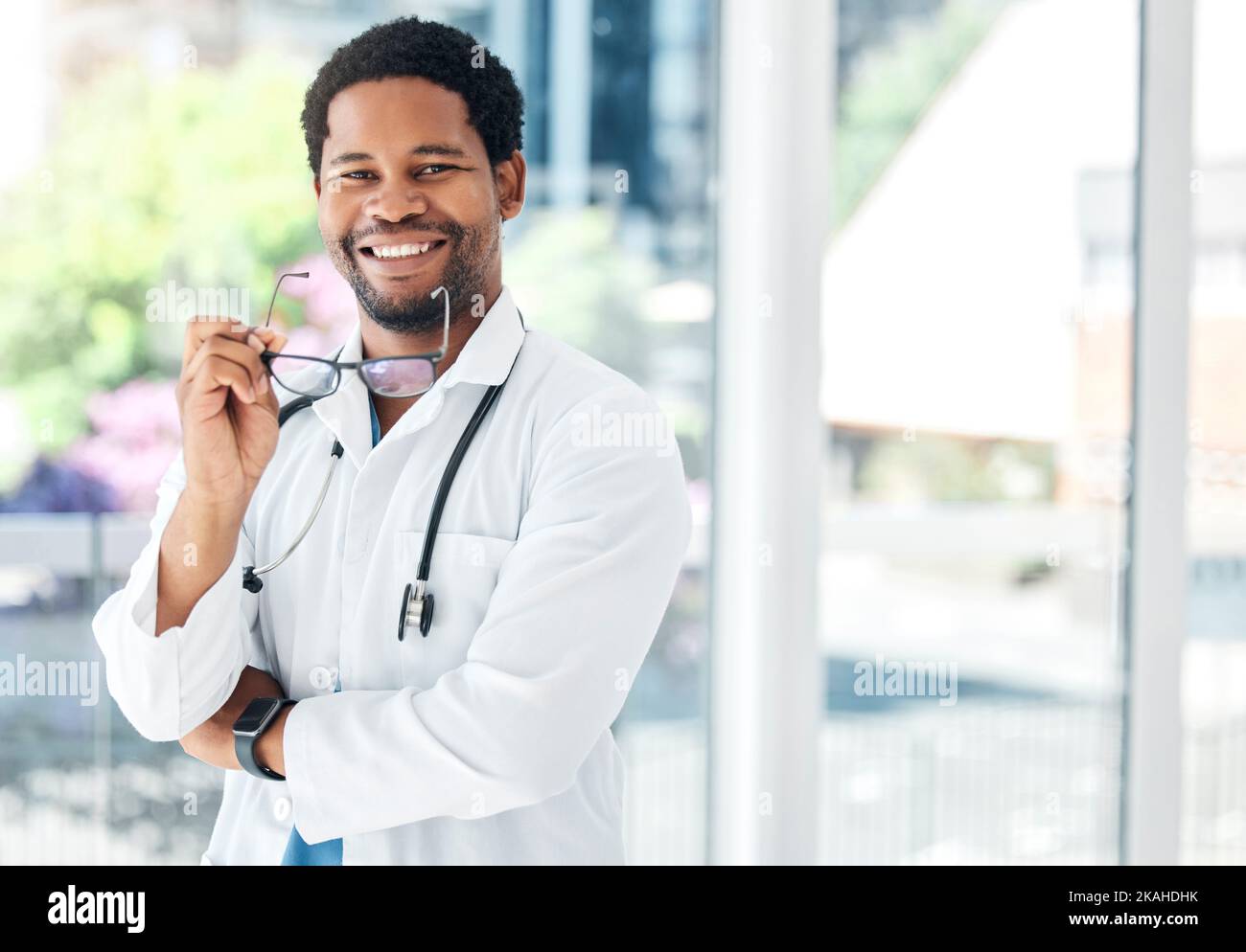 Smile, portrait and doctor in consulting room for healthcare, surgery ...