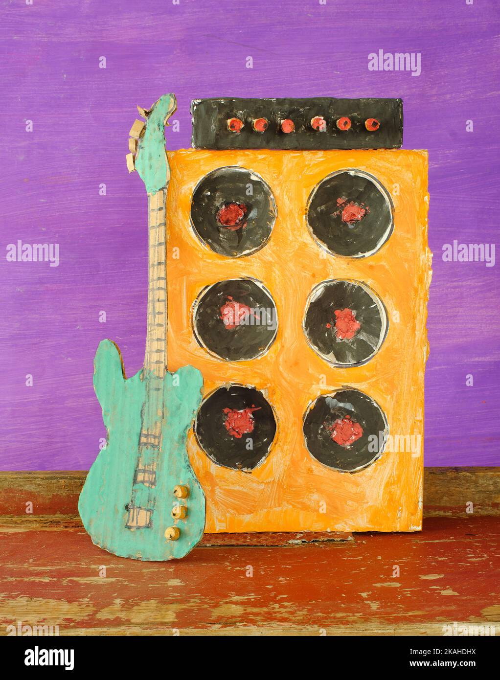Grungy cardboard model of a guitar and an amp stack,music, live ...