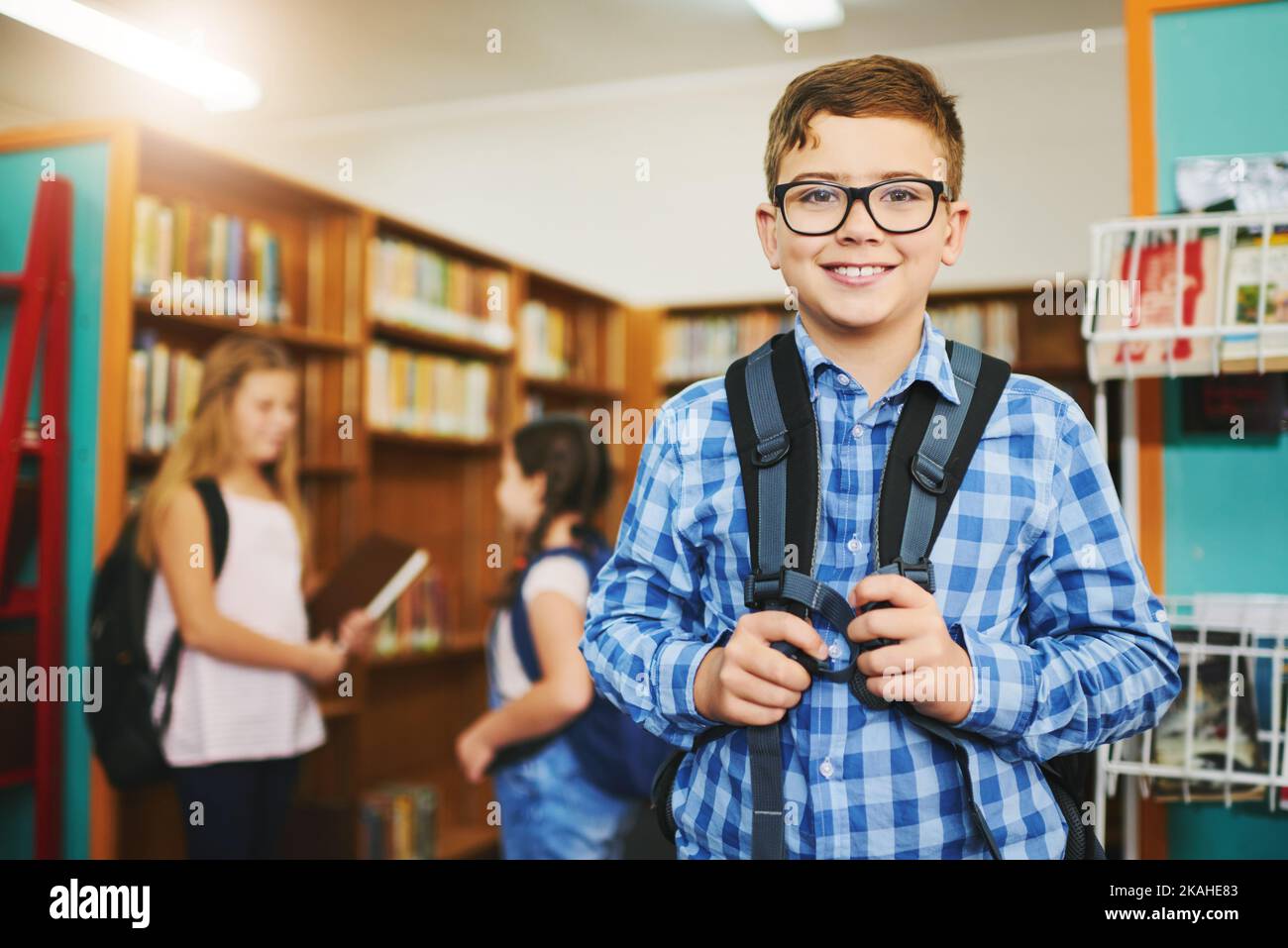 Im the new kid in school. Portrait of a cheerful young boy wearing a ...