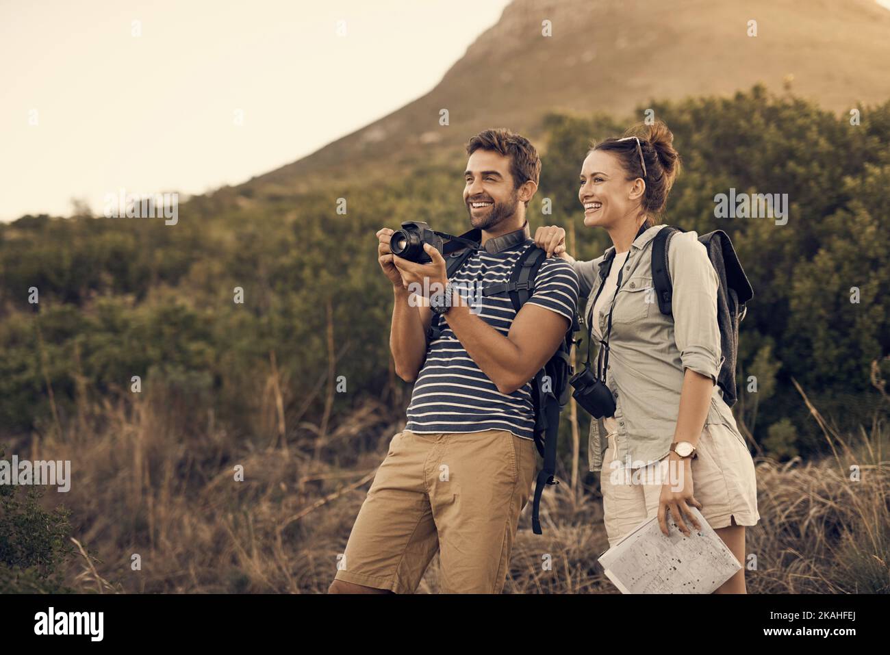 Date someone who shares the same interests. a couple taking pictures on ...