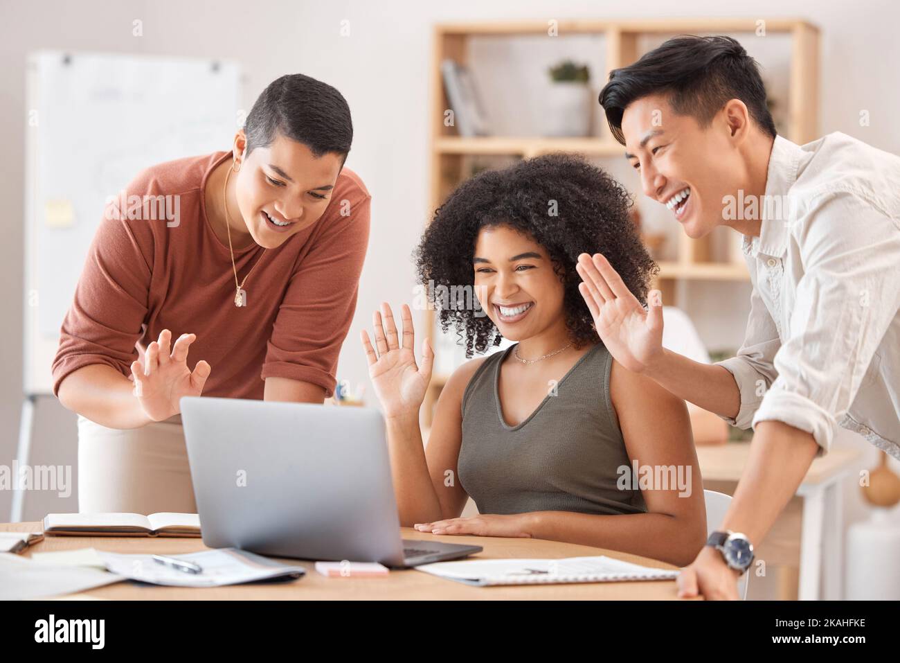 Video call communication, laptop and diversity business people wave ...