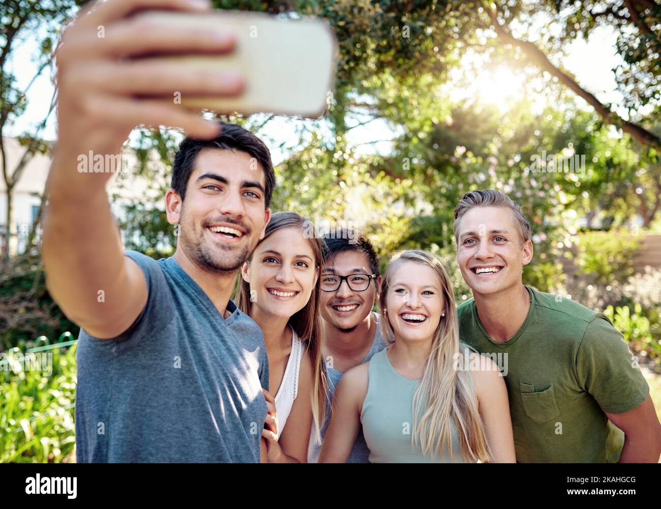 Smartphones make capturing moments easy. a young group of friends ...