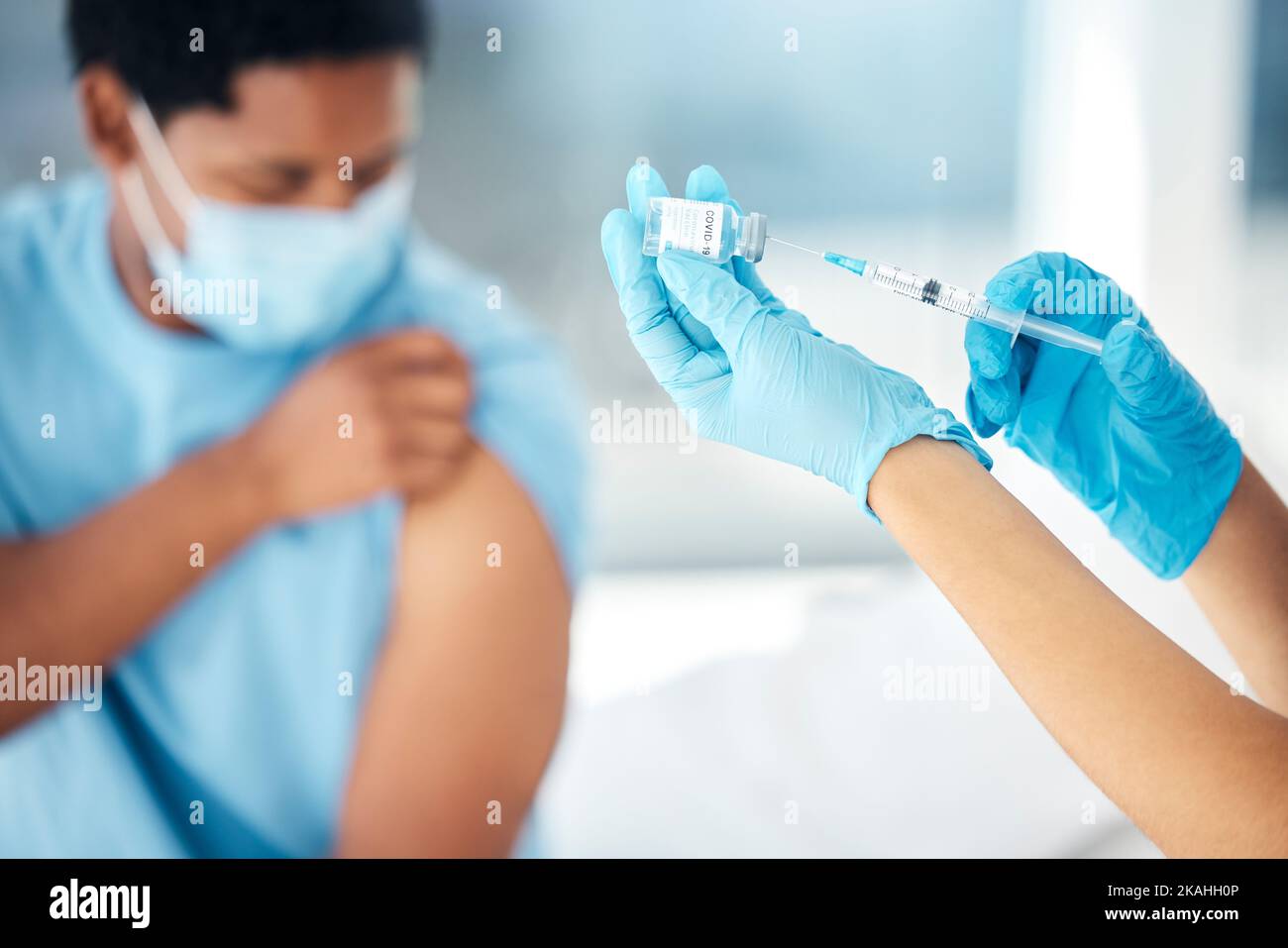 Doctor hands giving covid vaccine injection to patient for healthcare ...