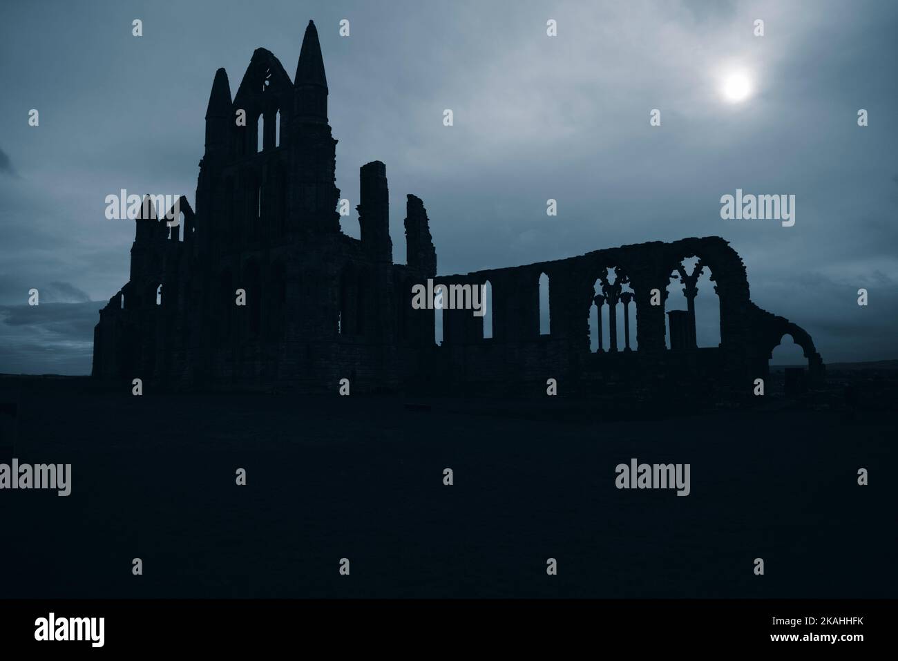 The remains of Whitby abbey tower over the Yorkshire coastal town Stock ...