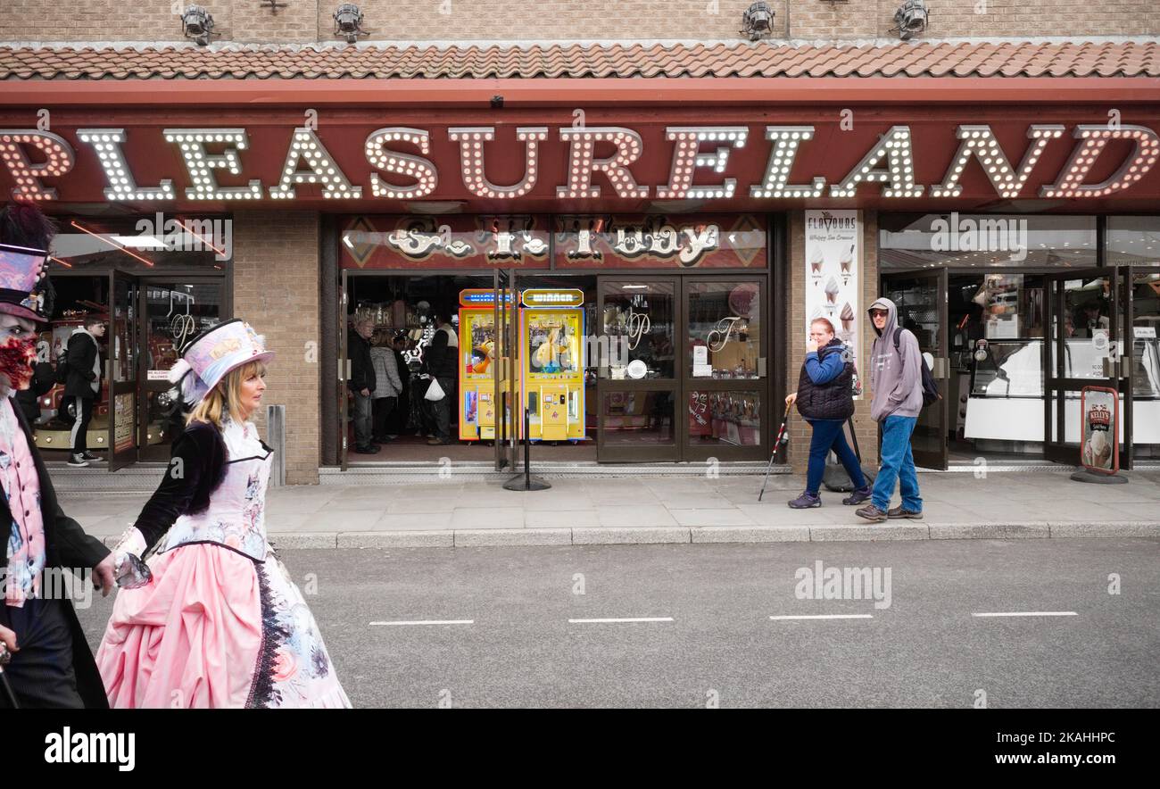 Whitby goth Sunday with couple dressed in Alice in Wonderland costumes ...