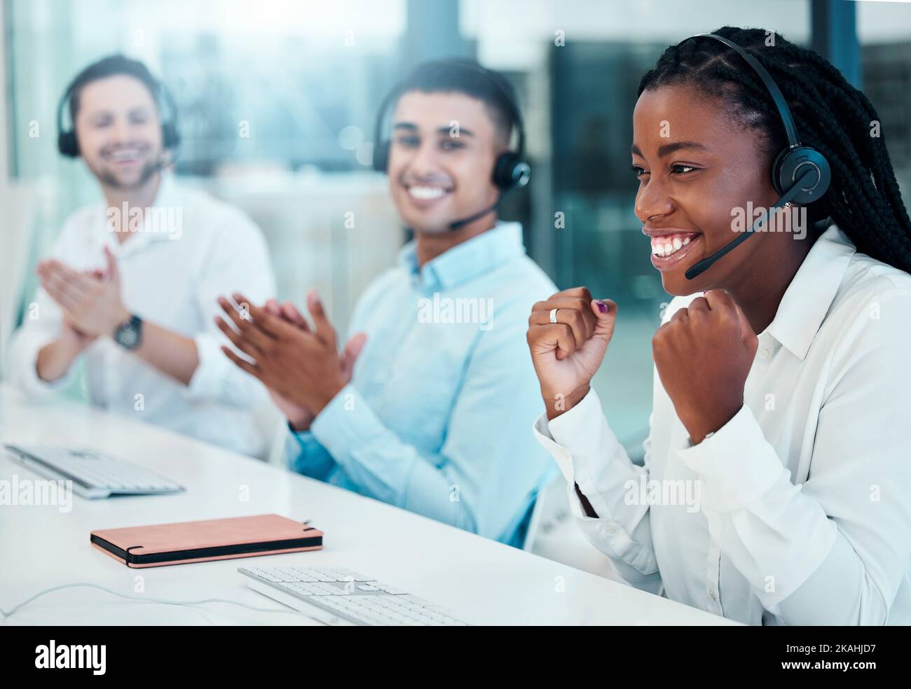 Black woman, fist or success in call center celebration, contact us ...