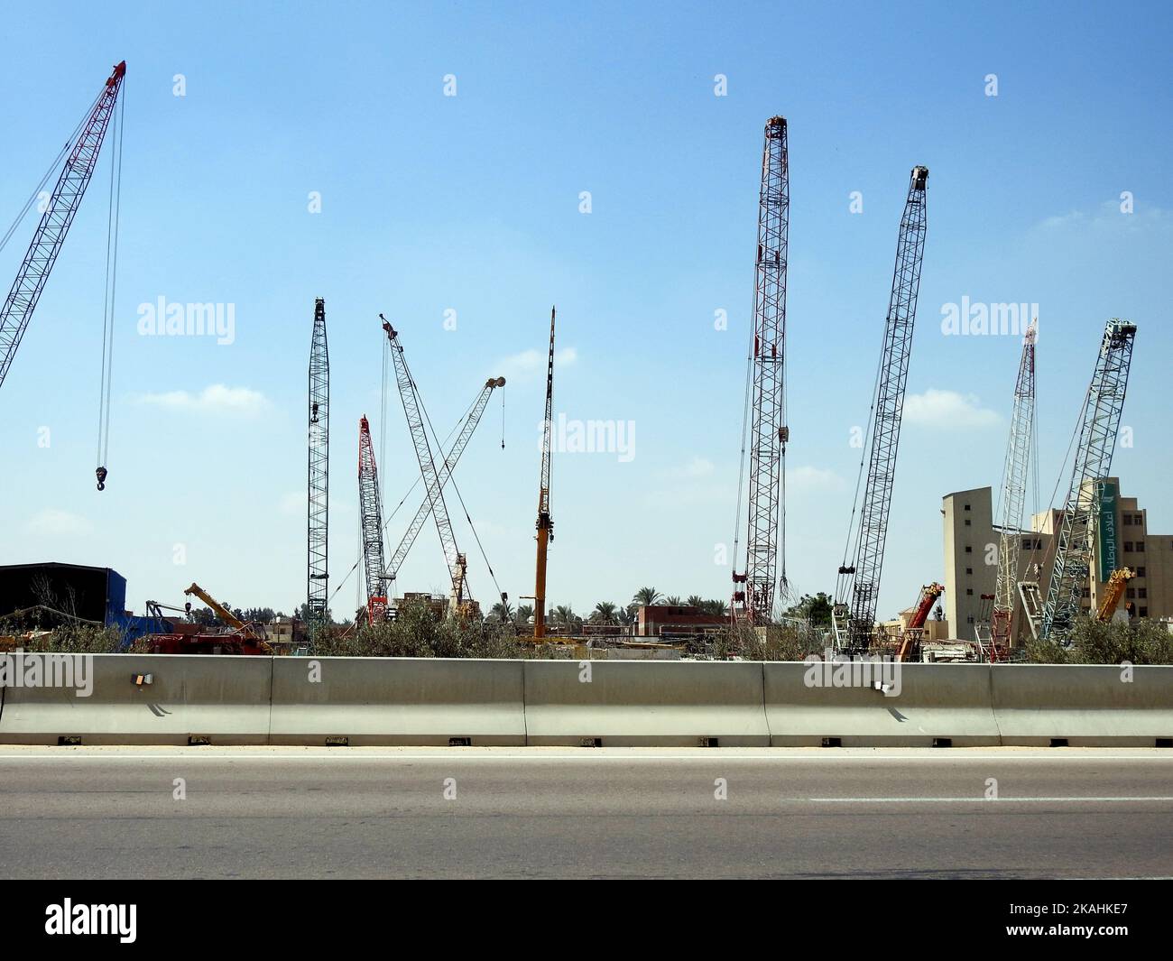Alexandria, Egypt, September 9 2022: many overhead cranes at the site ...