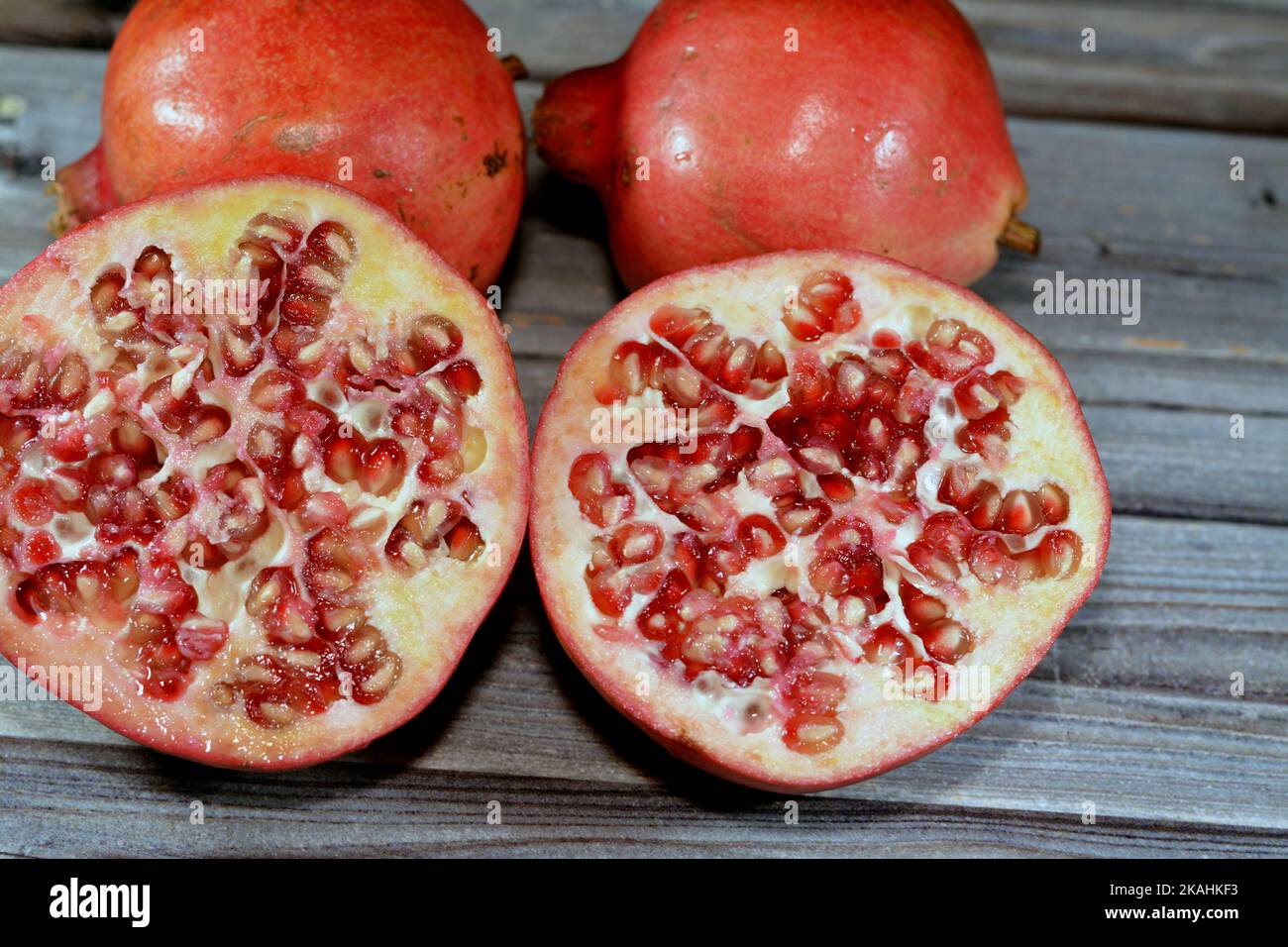 The pomegranate (Punica granatum), a fruit-bearing deciduous shrub in ...