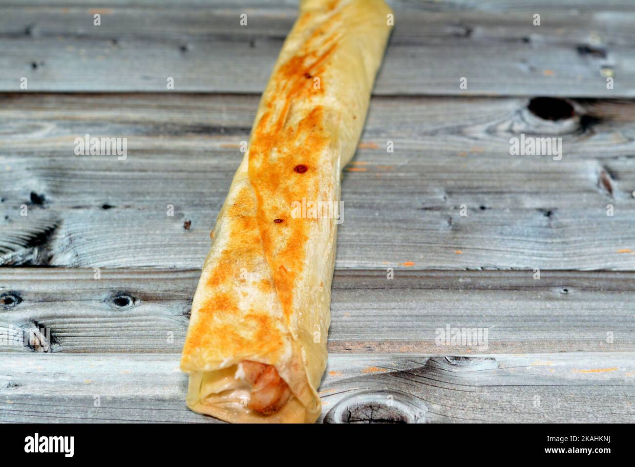 Syrian recipe cuisine background, chicken shawerma or shawarma tortilla ...