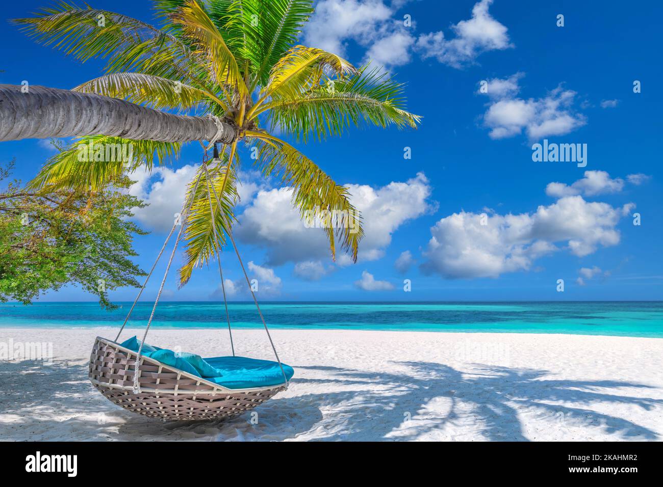 Tropical relax beach as summer island landscape with beach swing on palm, close to fantastic sea ...