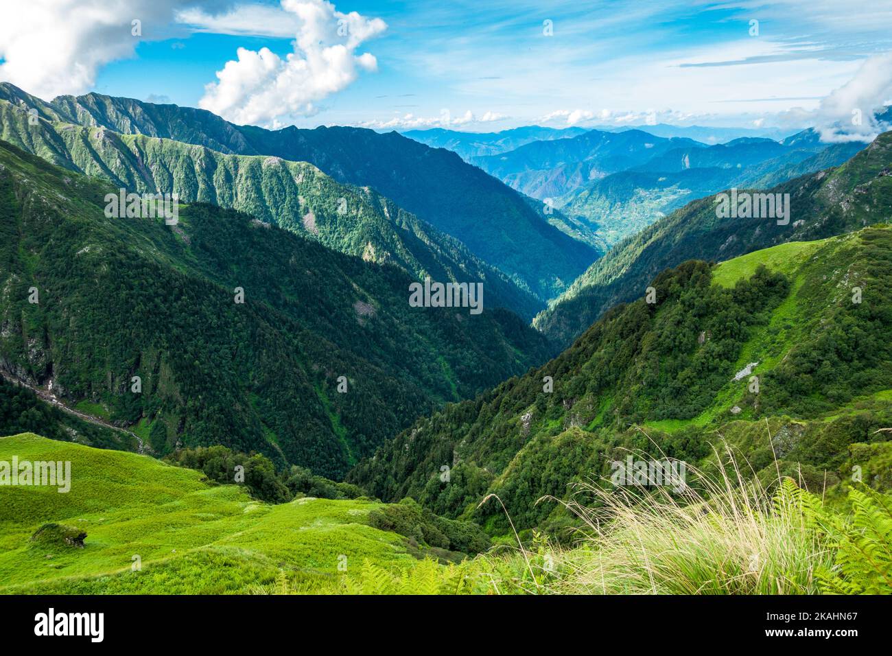 Beautiful mountains peaks and waterfalls in the background. Shrikhand ...