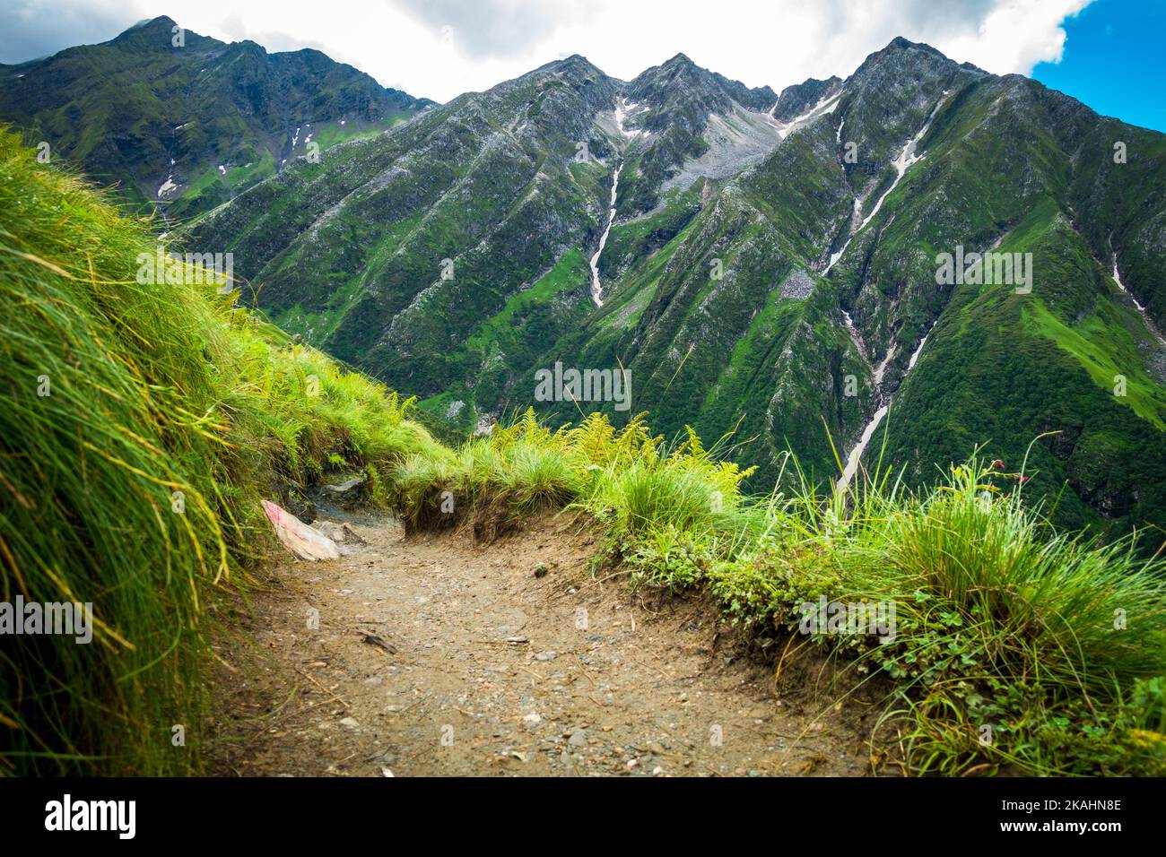 Trekking trail with Beautiful mountains peaks and waterfalls in the ...