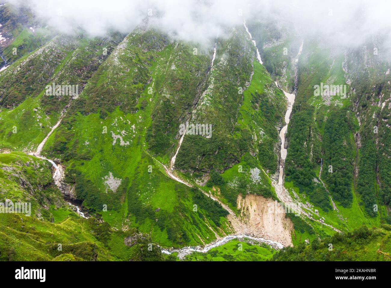 Beautiful mountains peaks and waterfalls in the background. Shrikhand Mahadev Kailash Himalaya ...