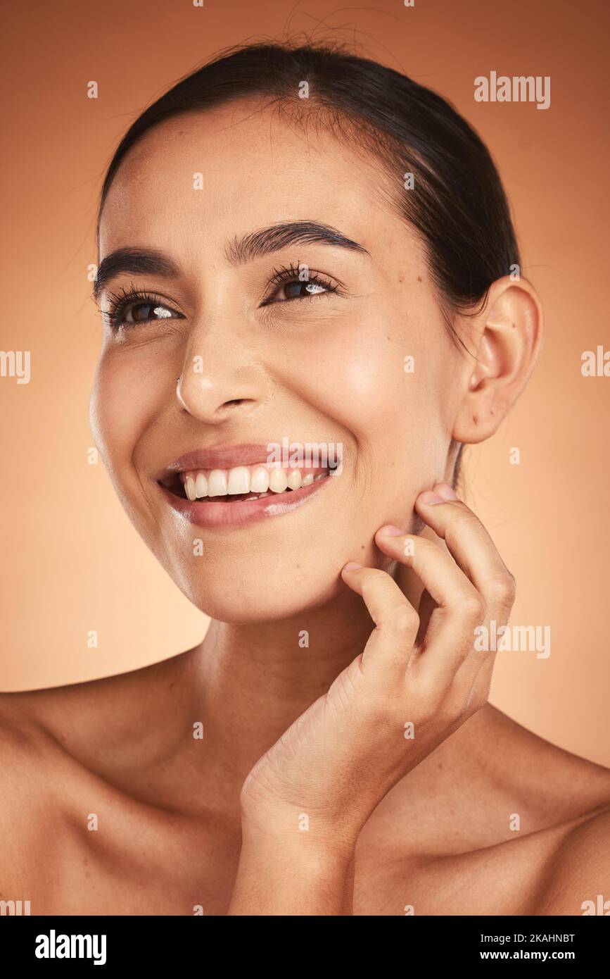 Skincare, makeup and woman thinking of cosmetics for face against a ...