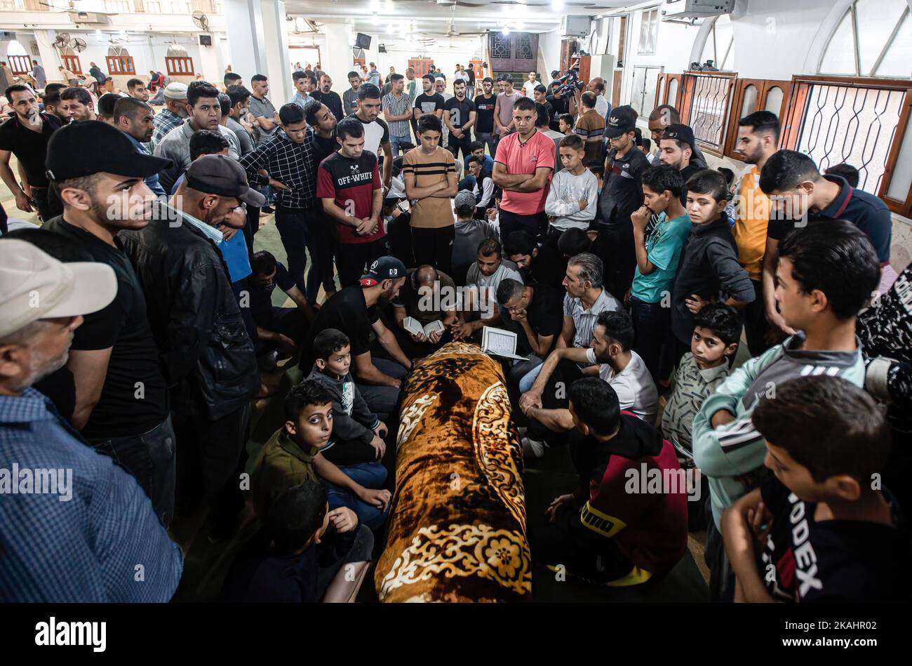 (EDITORS NOTE: Image depicts death) Palestinians mourn the two young ...