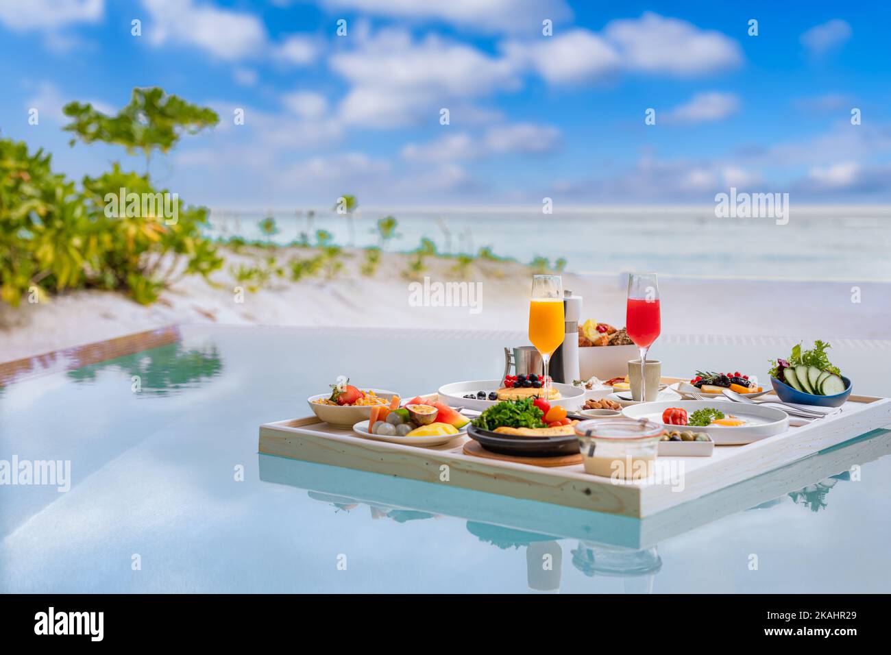 Breakfast in resort swimming pool, floating breakfast in luxury ...