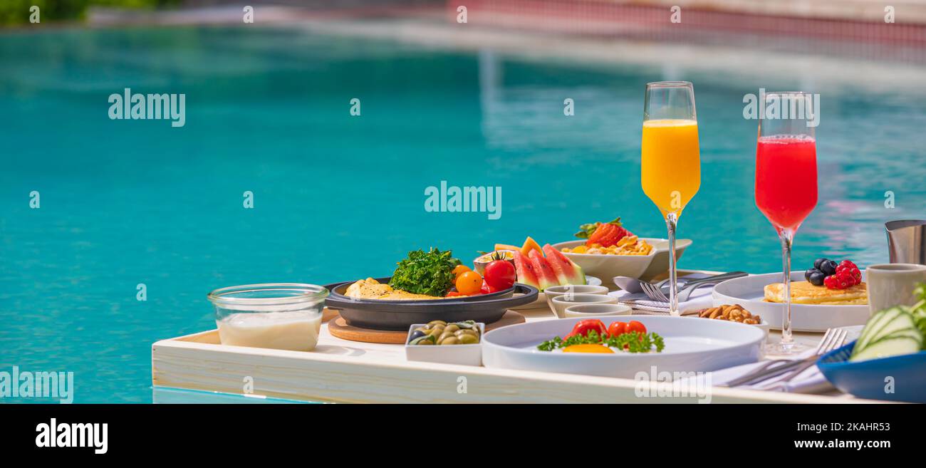 Breakfast in resort swimming pool, floating breakfast in luxury ...