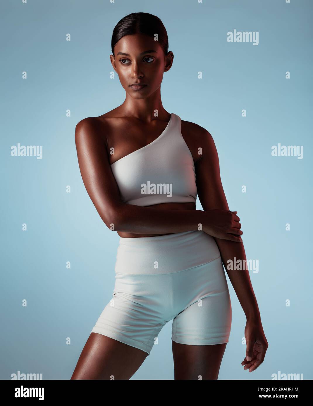 Fitness, fashion and body of black woman in studio blue mock up for ...