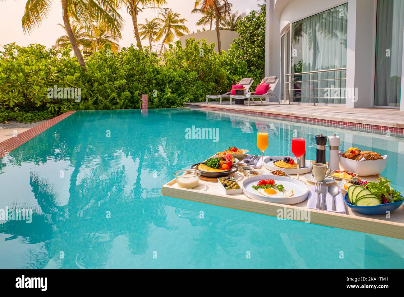 Breakfast in swimming pool, floating breakfast in luxurious tropical ...