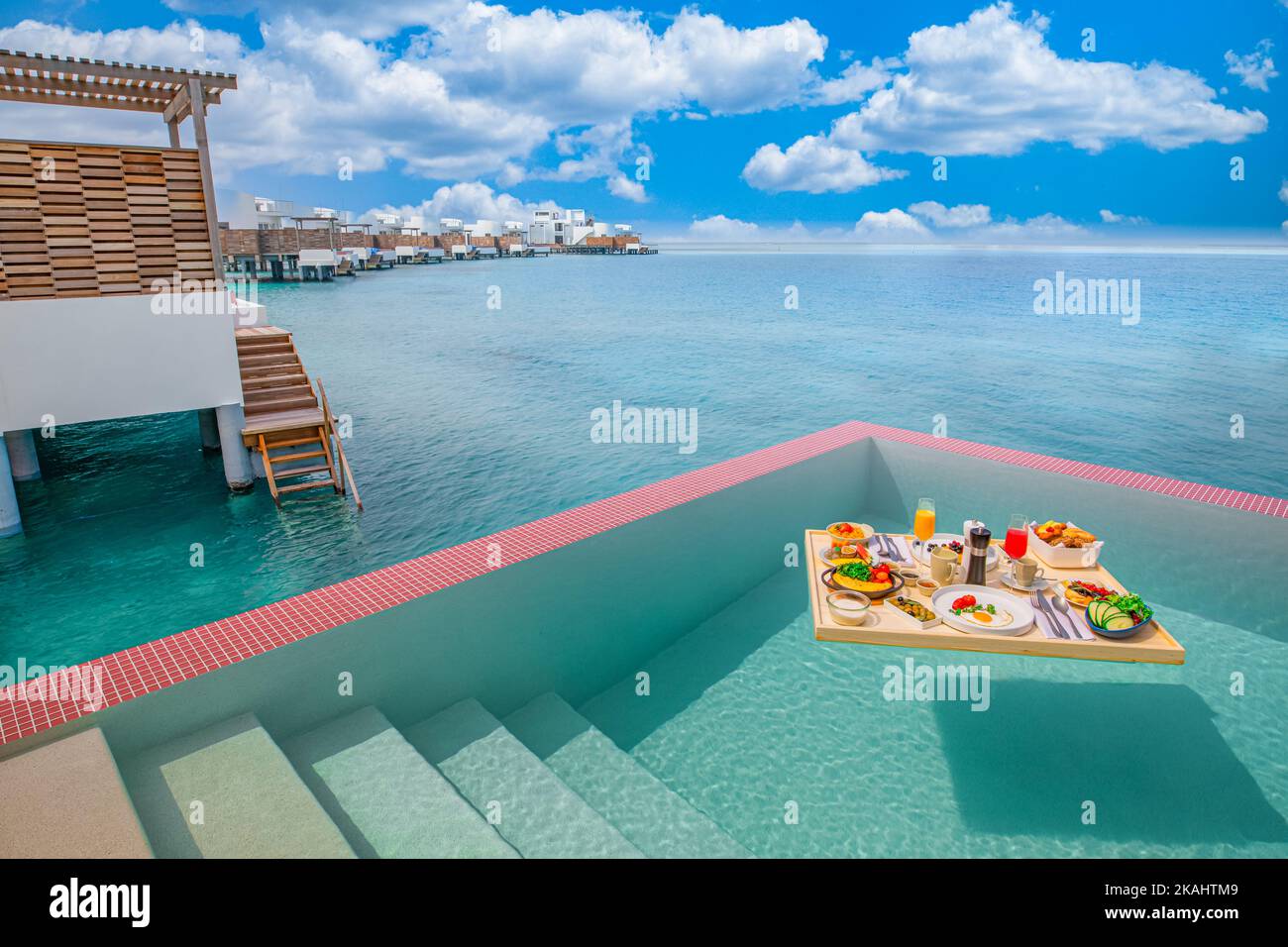 Breakfast in swimming pool, floating breakfast in luxurious tropical ...